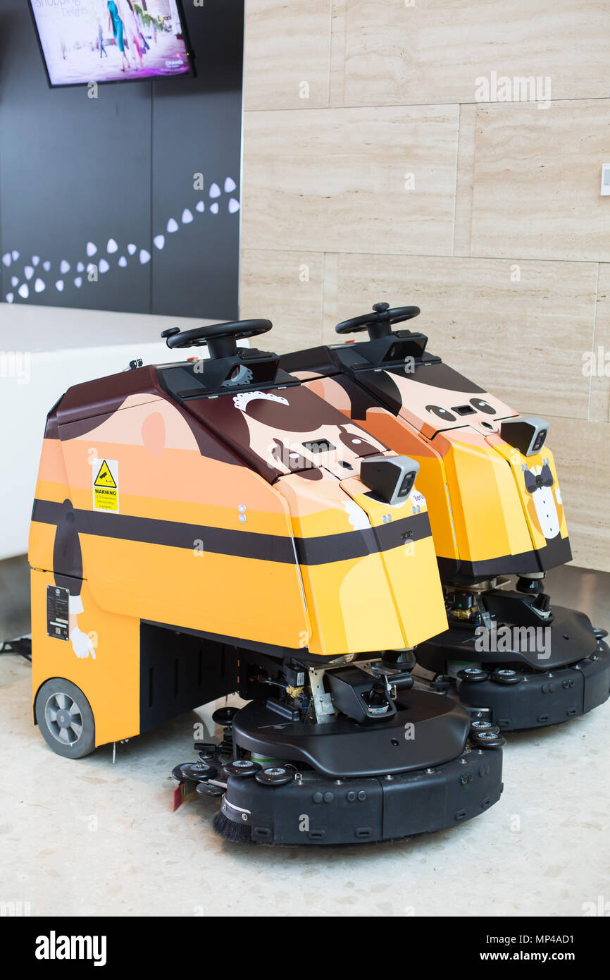Vertical view of automated industrial cleaning robots to keep Changi ...