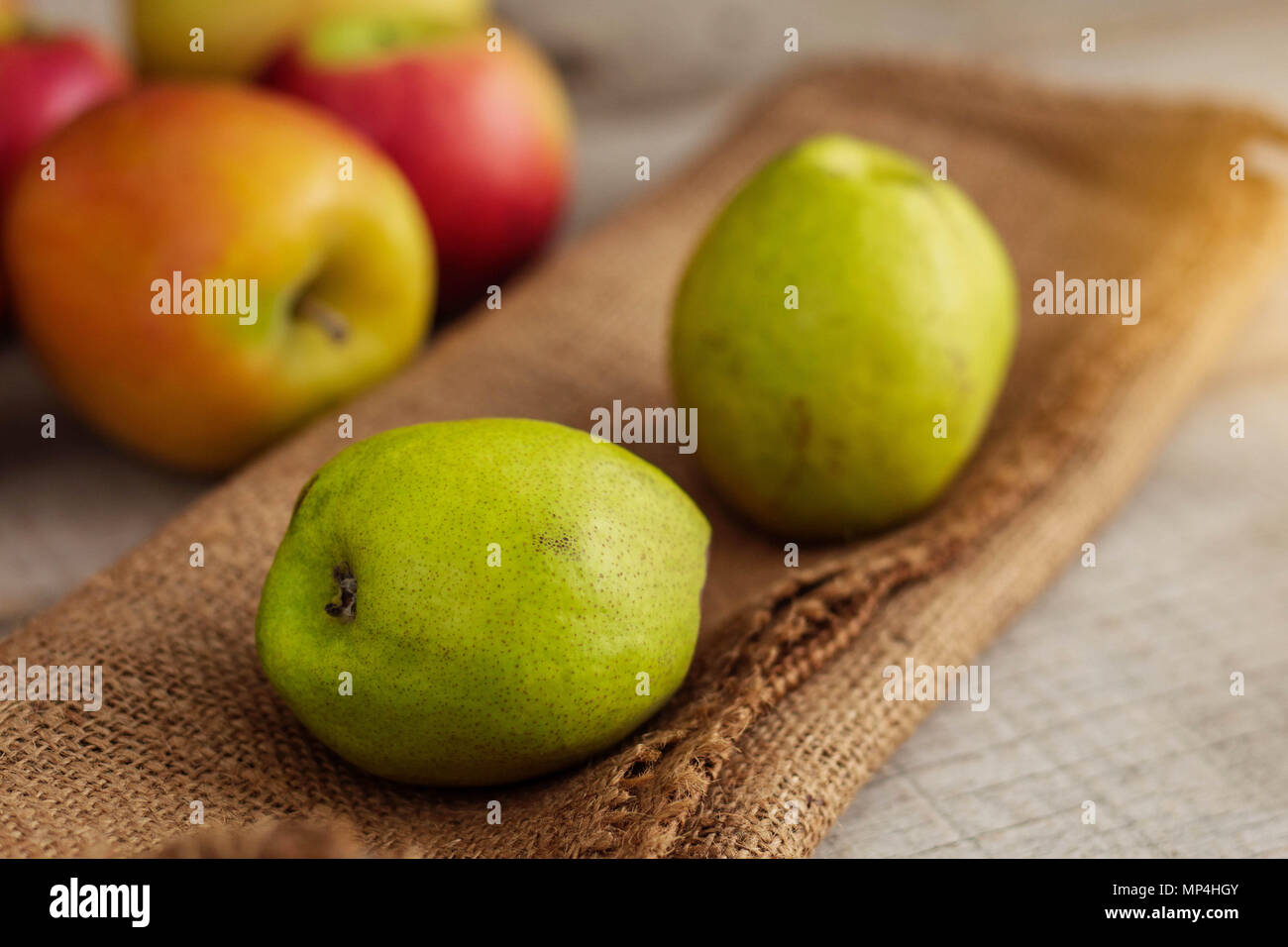 Pears and fresh apples from the farm on sacks Stock Photo - Alamy