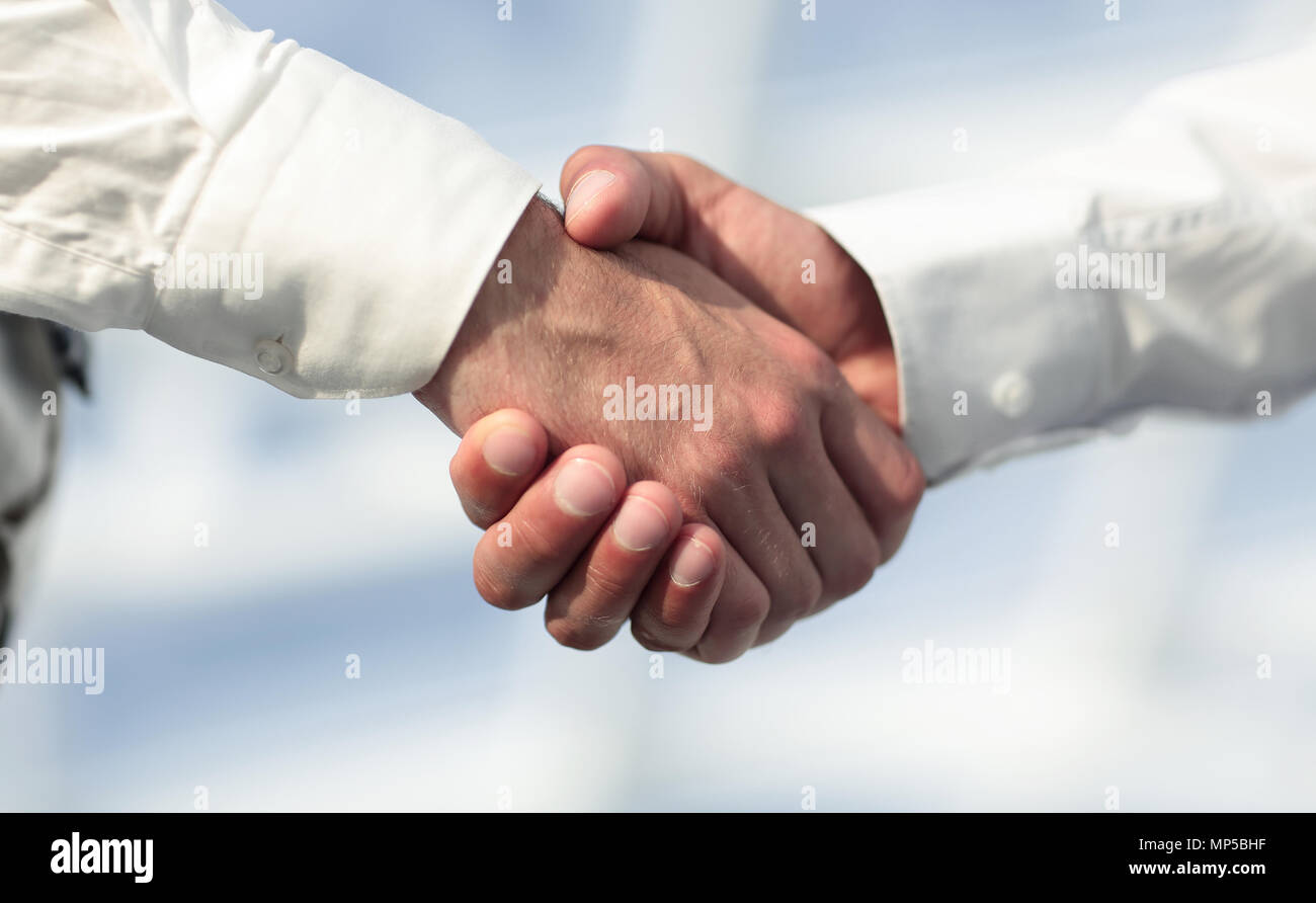 Close-up photo of handshake of two successful businessmen Stock Photo ...