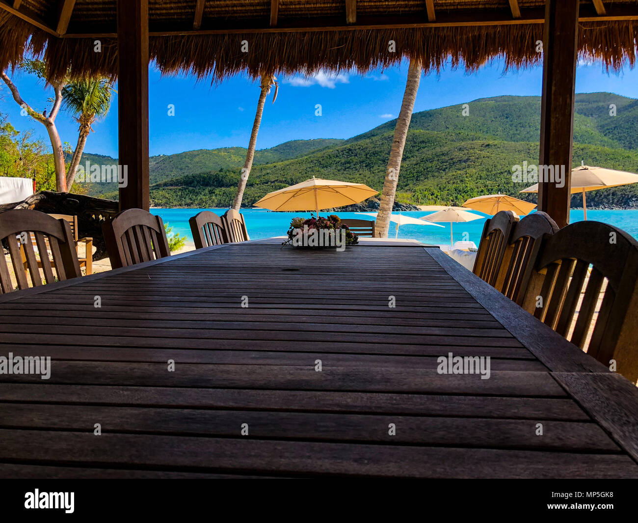 Wooden caribbean beach table Stock Photo - Alamy
