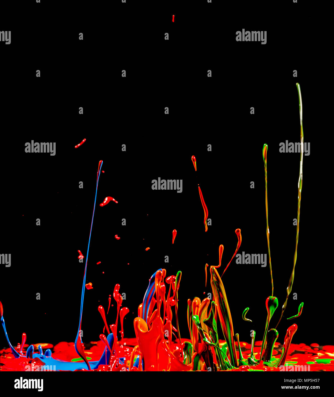 Abstract color splash on black background Stock Photo - Alamy