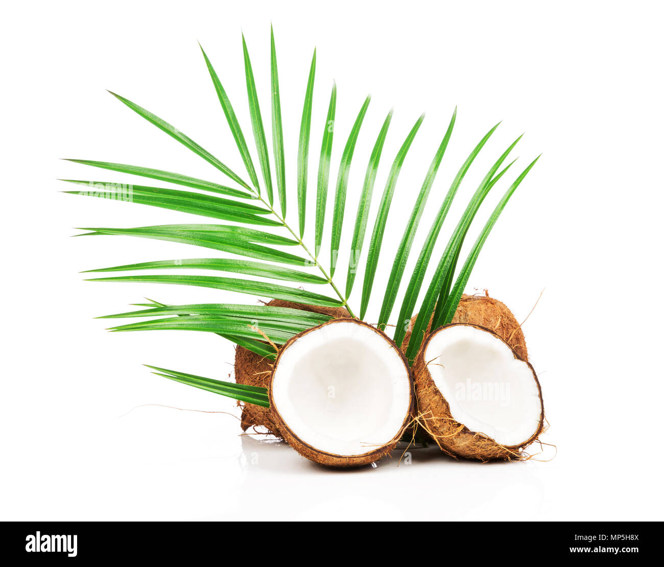 Halves coconuts on brown Cut Out Stock Images & Pictures - Alamy
