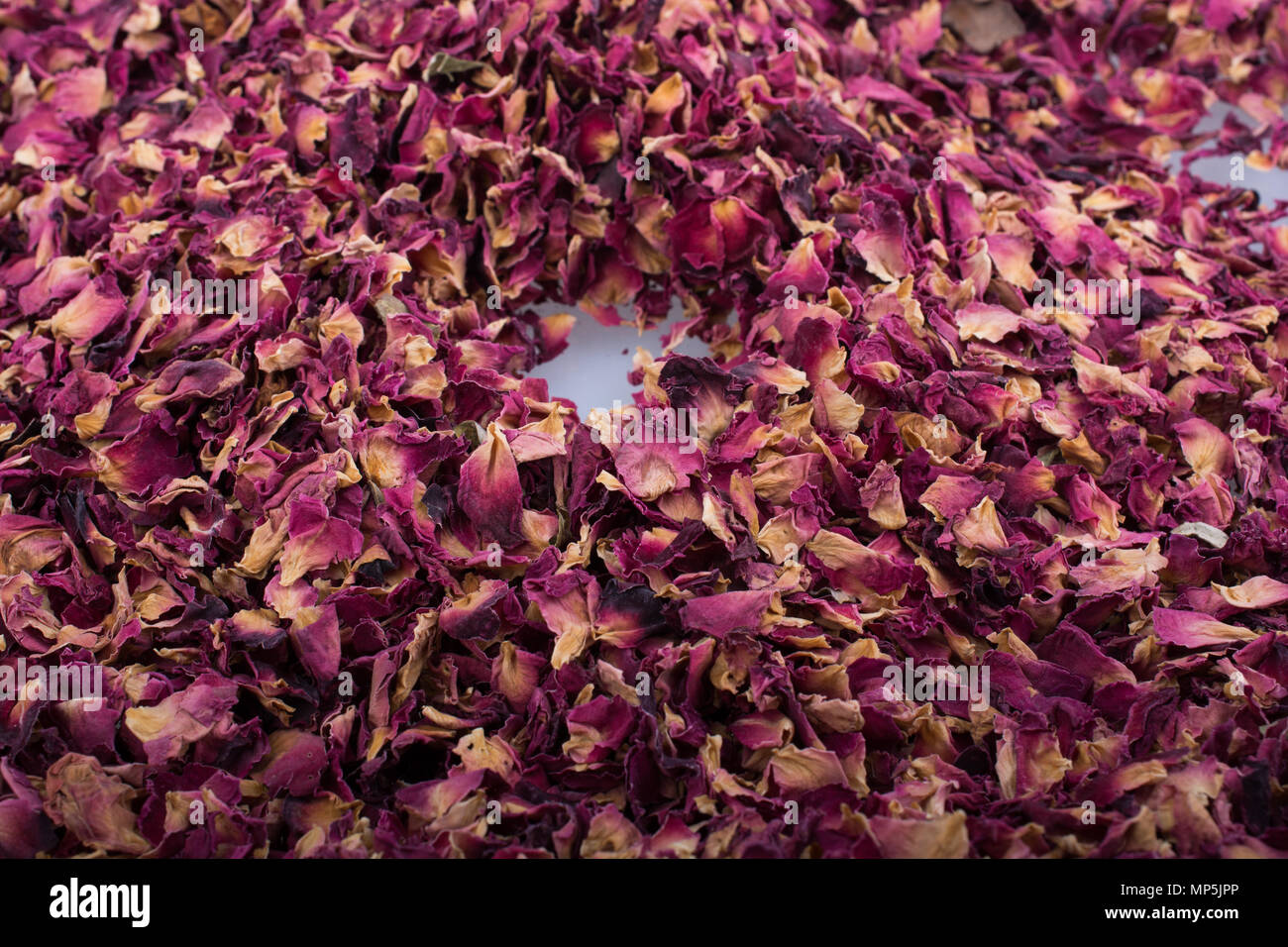 Background of dried rose petals as herbal tea Stock Photo - Alamy