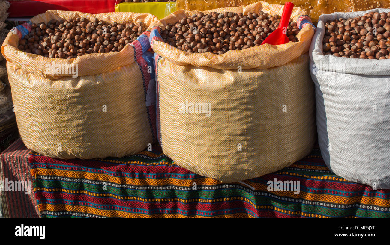 Dried unshelled hazelnuts seeds of Whole nuts in sacks Stock Photo - Alamy