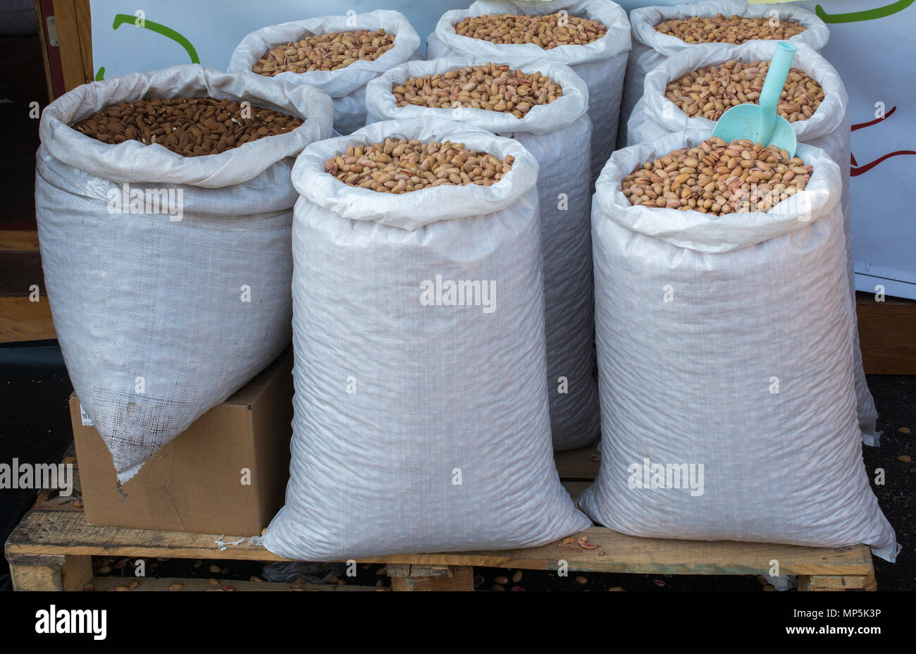 Pistachio nuts with shell ready to eat in sacks Stock Photo - Alamy