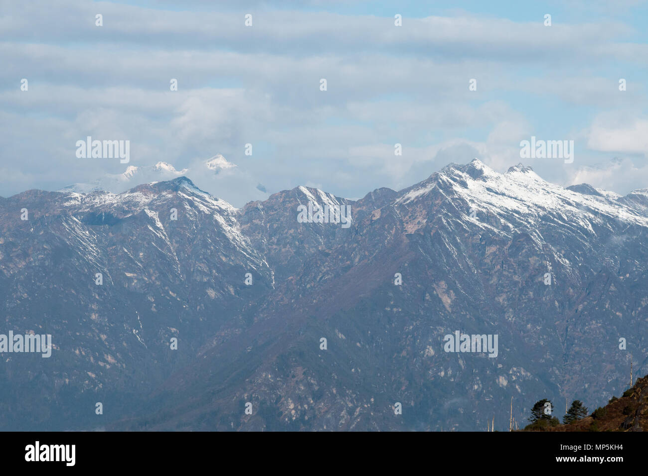 Snow and iced covered Himalayan mountains, seen from a hike near Paro ...