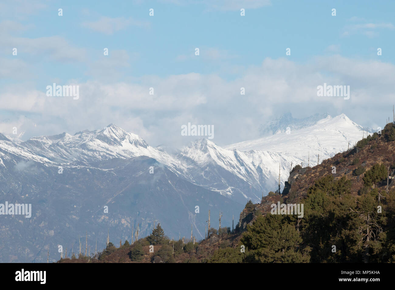 Snow and iced covered Himalayan mountains, seen from a hike near Paro ...