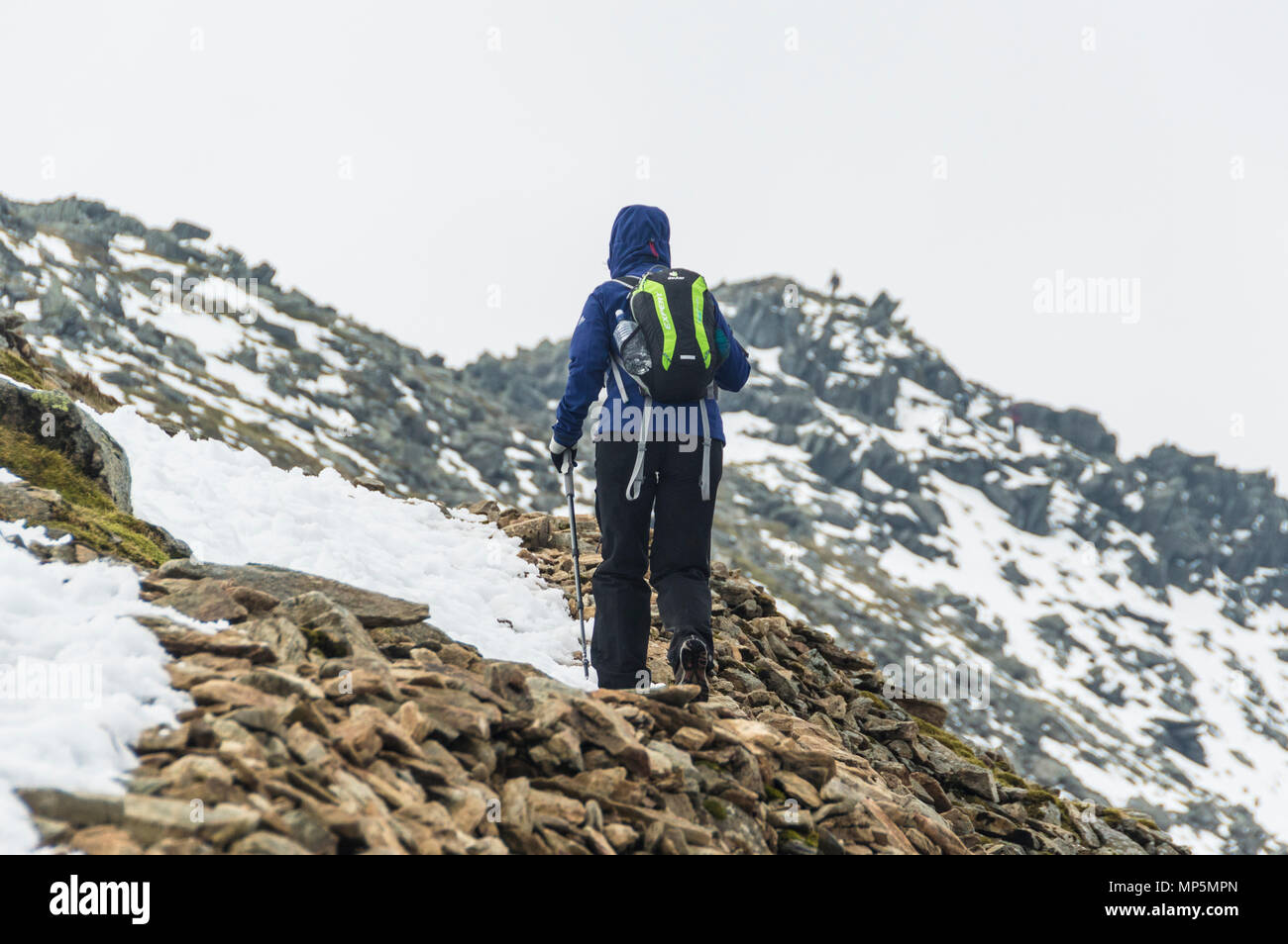 Striding edge winter walker snow hi-res stock photography and images ...