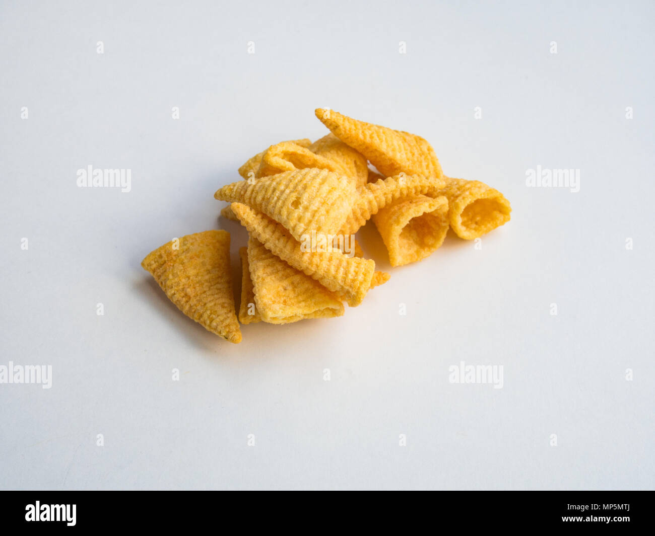 Corn cones on white background Stock Photo - Alamy