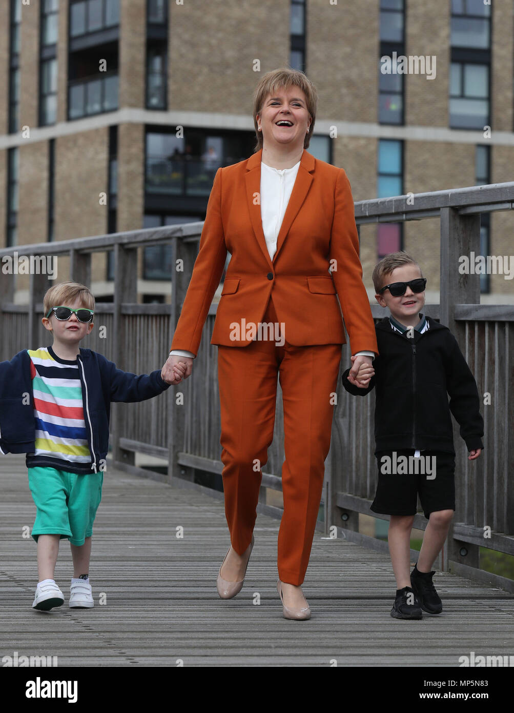First Minister Nicola Sturgeon with Brody Downs (left) and Jack McGeady ...