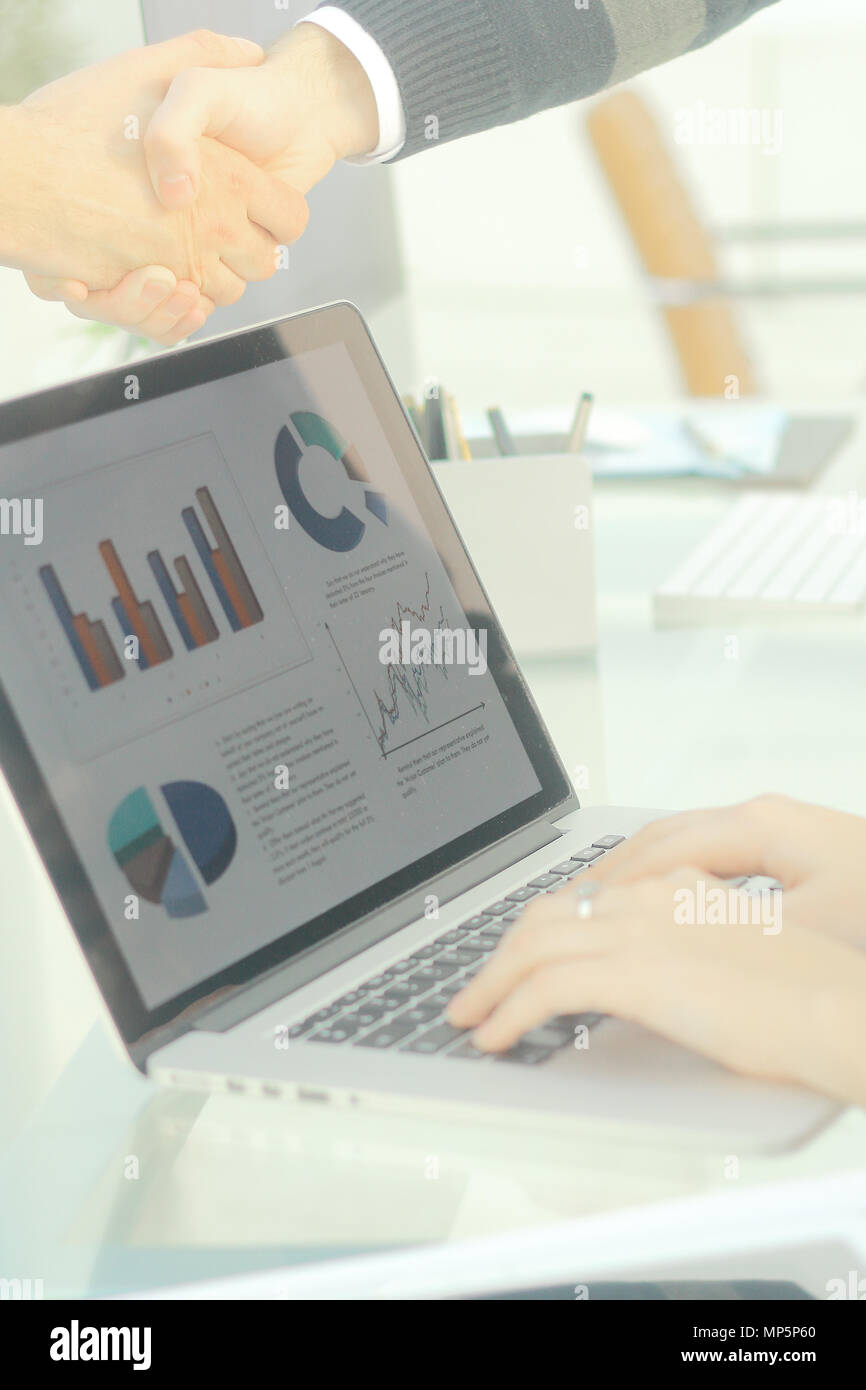 closeup.background image handshake financial partners Stock Photo - Alamy