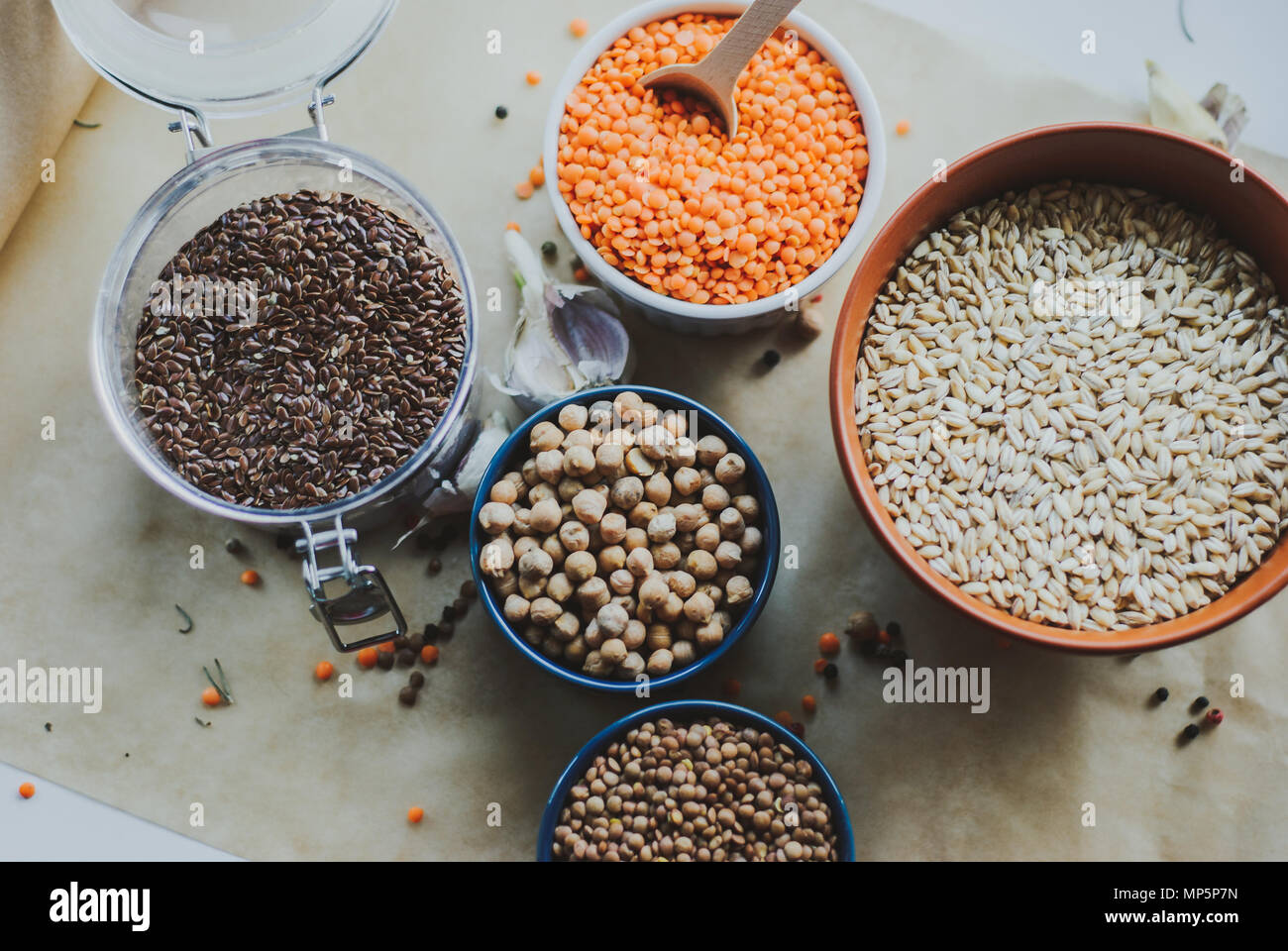 vegetarian food in ceramic bowls on rustic background Stock Photo - Alamy