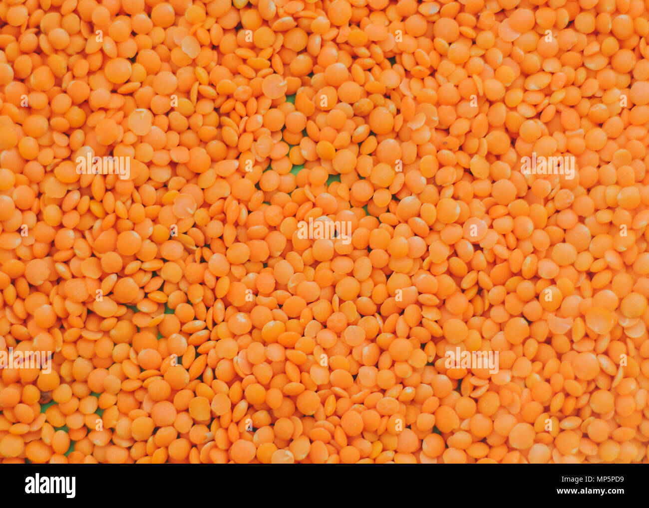raw red lentil close up background, texture Stock Photo - Alamy