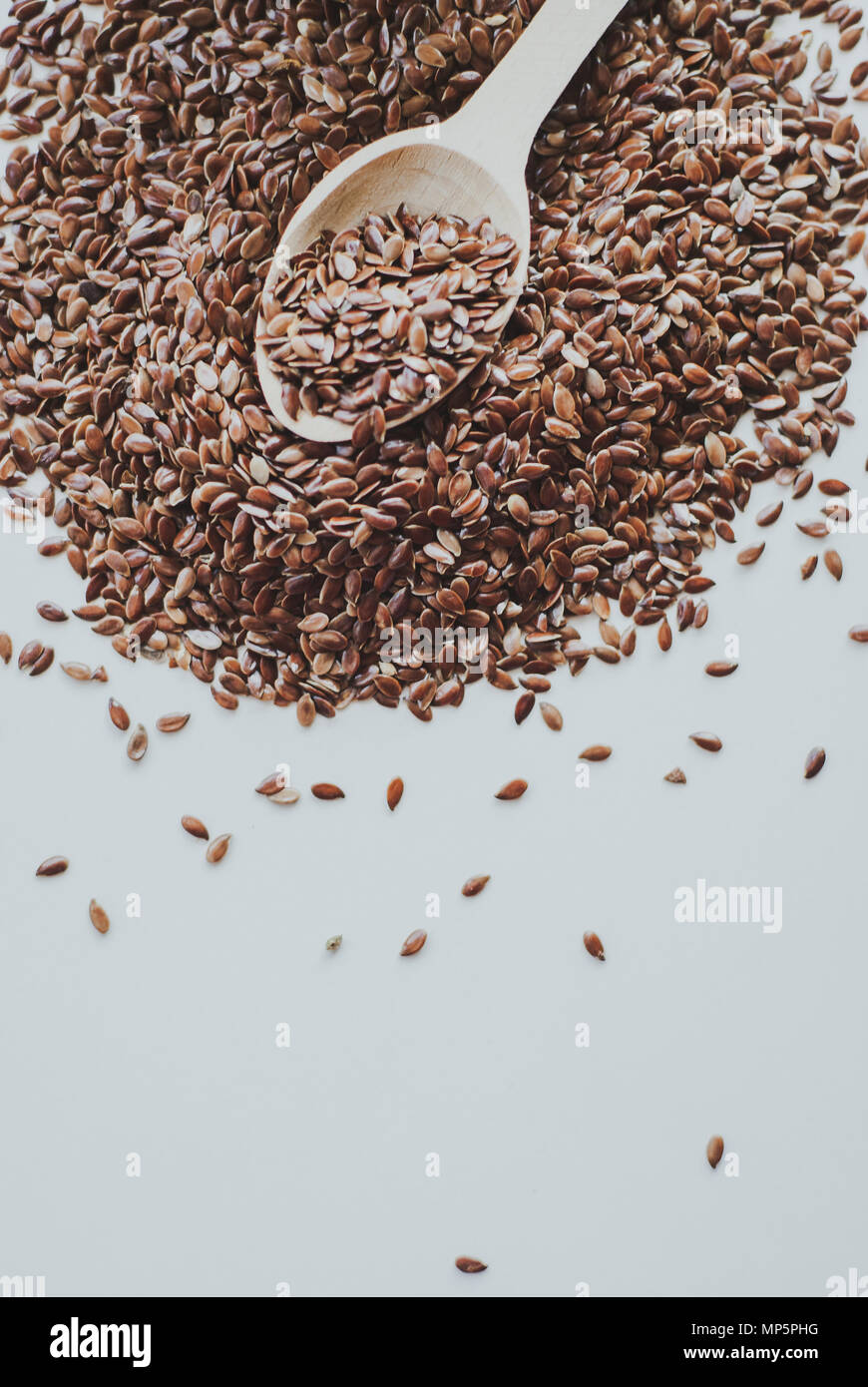 wooden spoon of brown flaxseed or linseed. Cereals. Vitamins. Healthy food Stock Photo - Alamy
