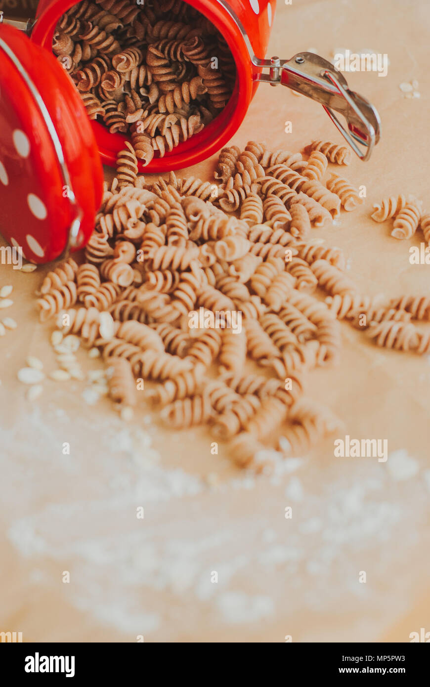 Spiral pasta fusilli falling from hi-res stock photography and images ...