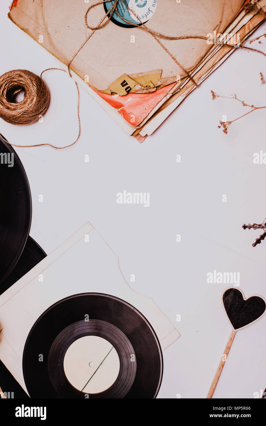 Stack of scratched dusty old vinyl records tied with rope Stock Photo ...