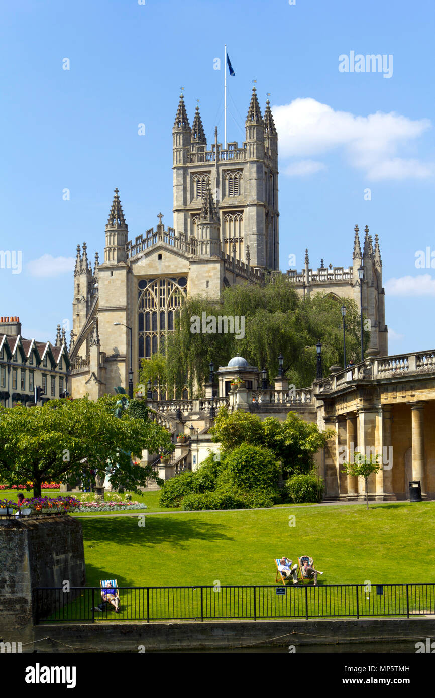 Bath, UK - 3rd July 2011: People relax in a park near historic Bath ...