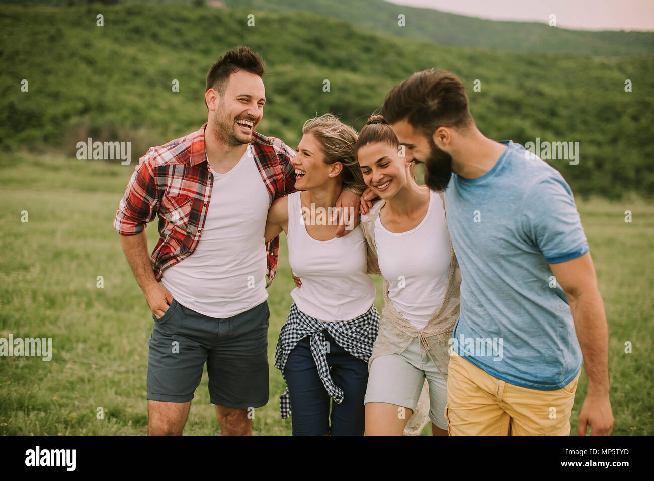 Group od young people having fun on a trip in nature on mountain Stock ...