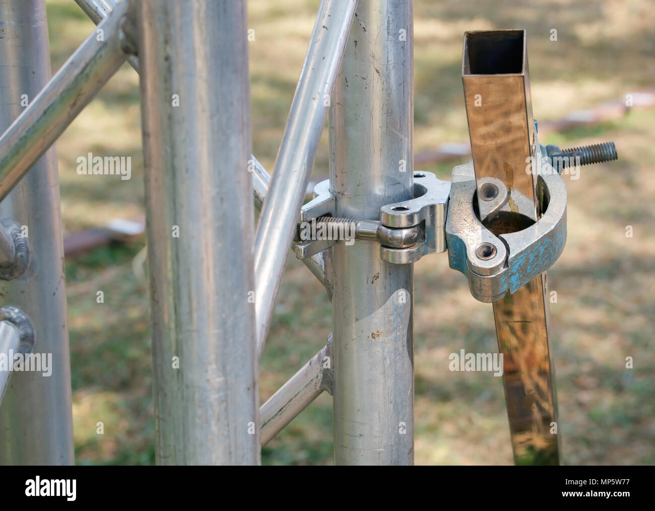 Close up metal scaffolding clamps Stock Photo - Alamy