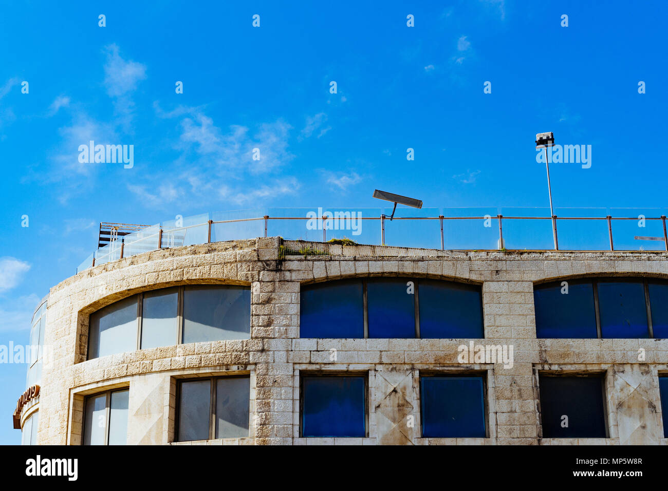 A building in Israel with a nice blue sky behind it Stock Photo - Alamy
