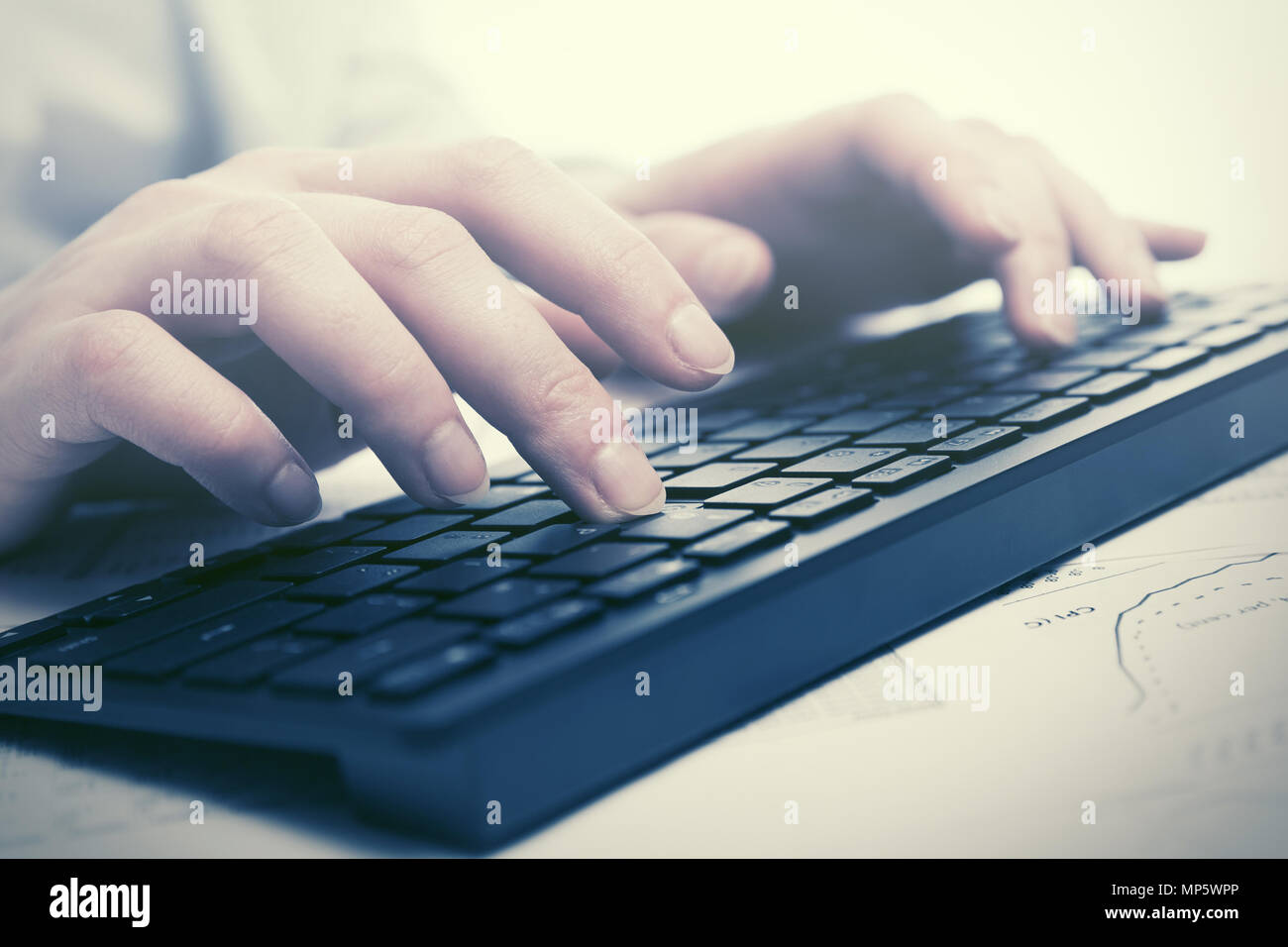 Business woman using computer keyboard Stock Photo - Alamy