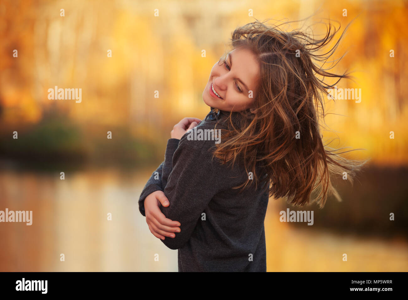 Young girl in black sweater hi-res stock photography and images - Alamy