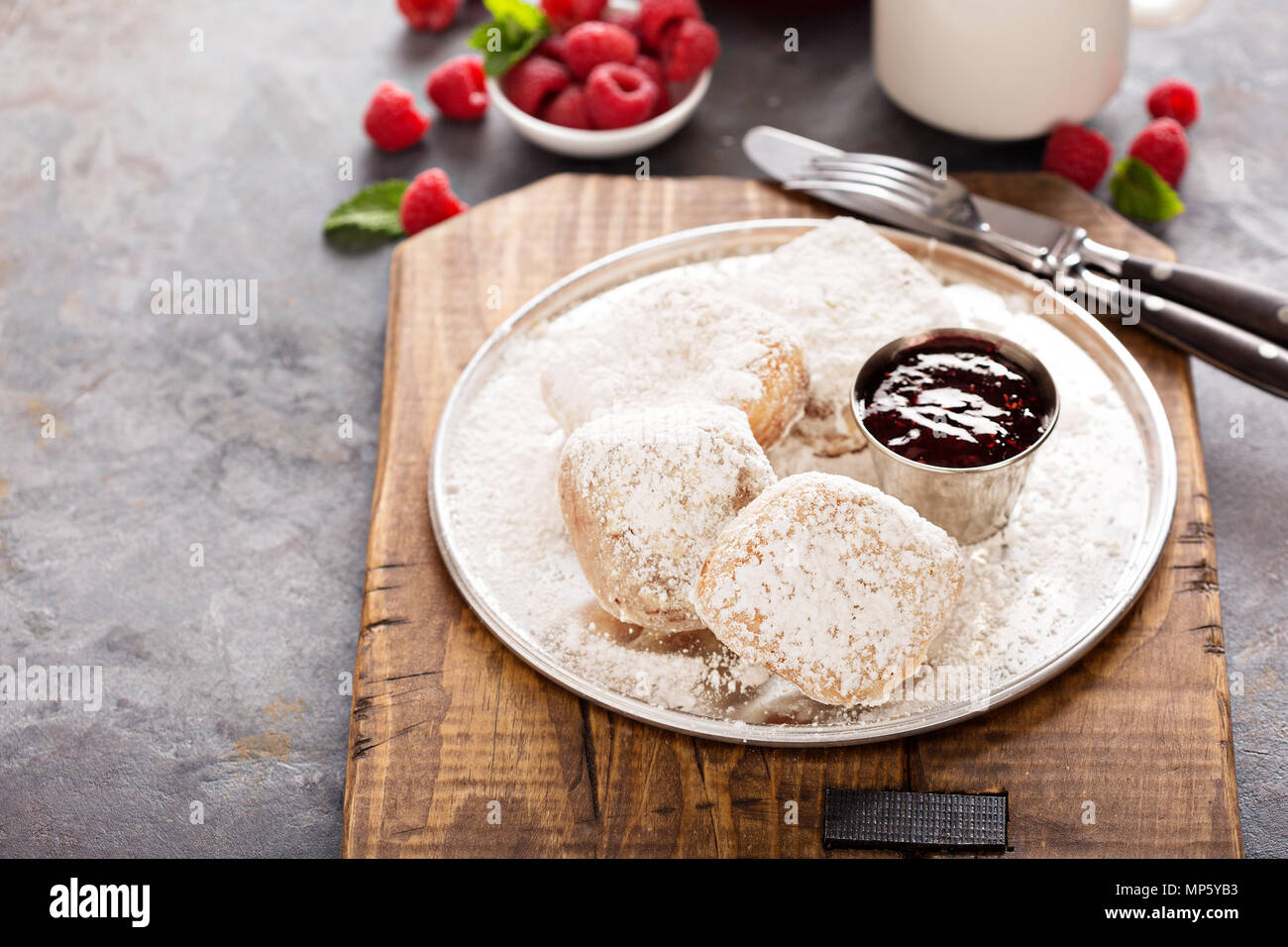 Beignets with raspberry jam Stock Photo - Alamy