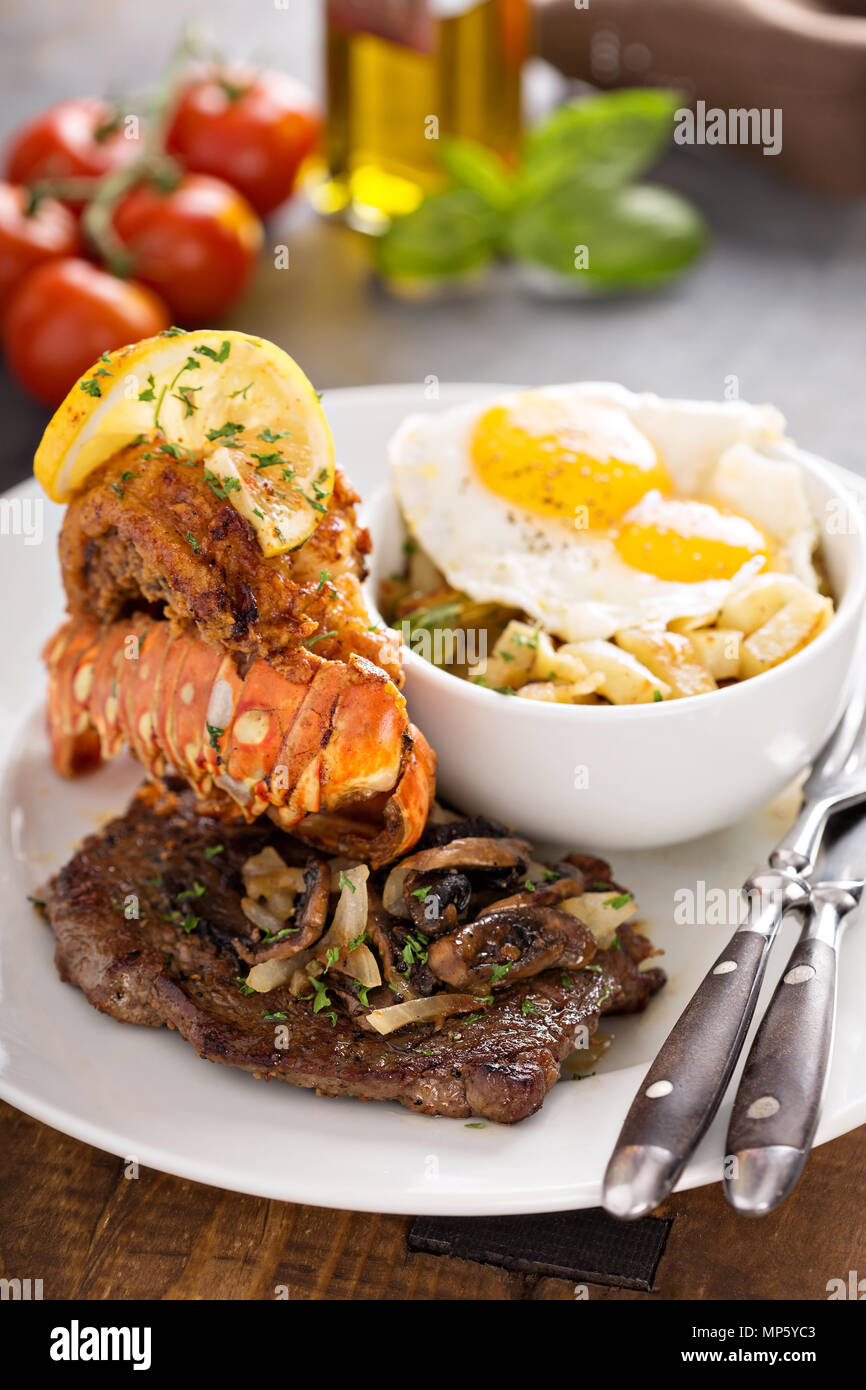 Southern surf and turf with potatoes and eggs Stock Photo - Alamy