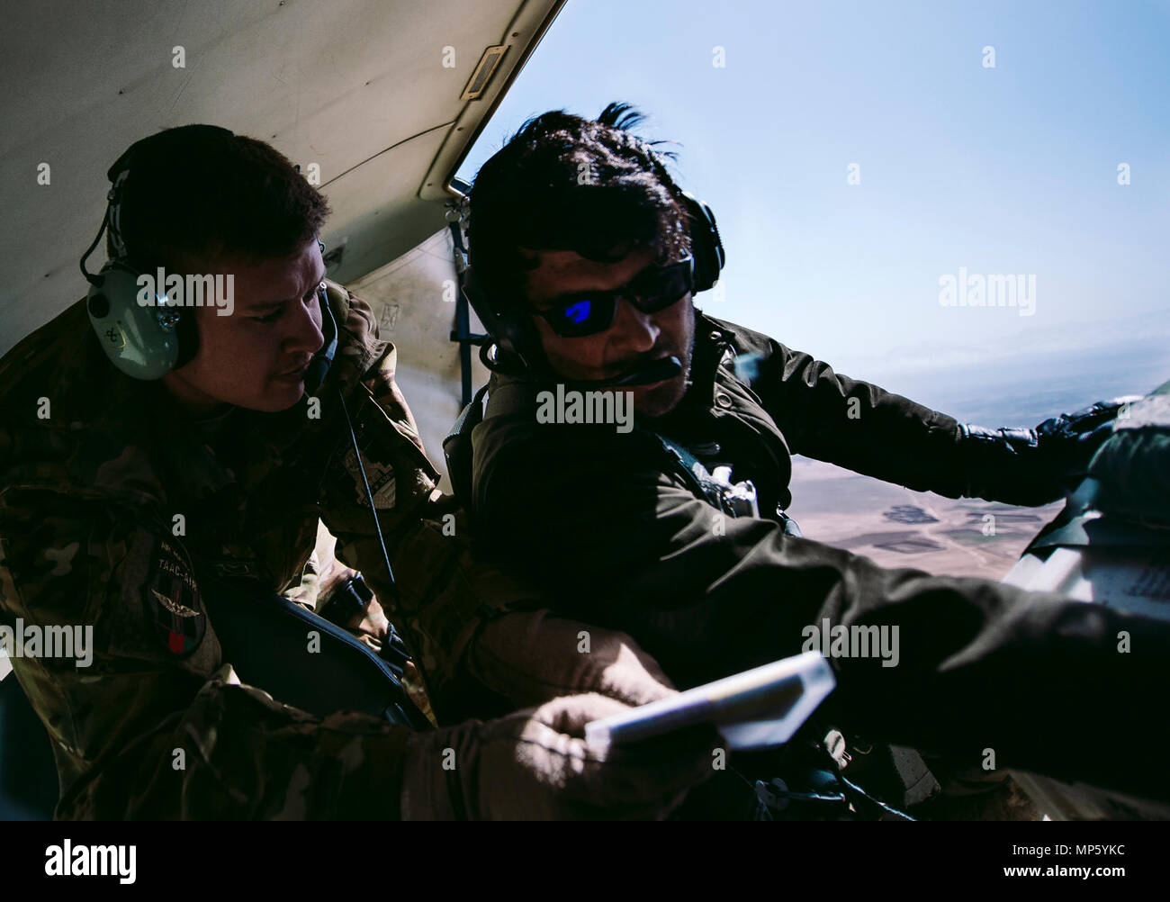 An Airman with Train, Advise, Assist Command-Air, as part of Resolute Support Mission, goes ...