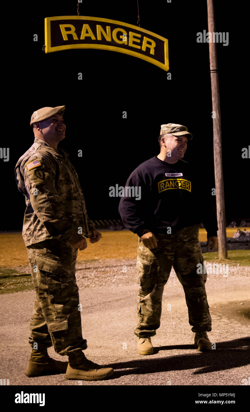 U.S. Army rangers wait for the participants of the Best Ranger ...