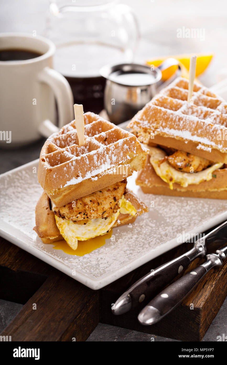 Waffle, fried egg and fish sandwich Stock Photo - Alamy