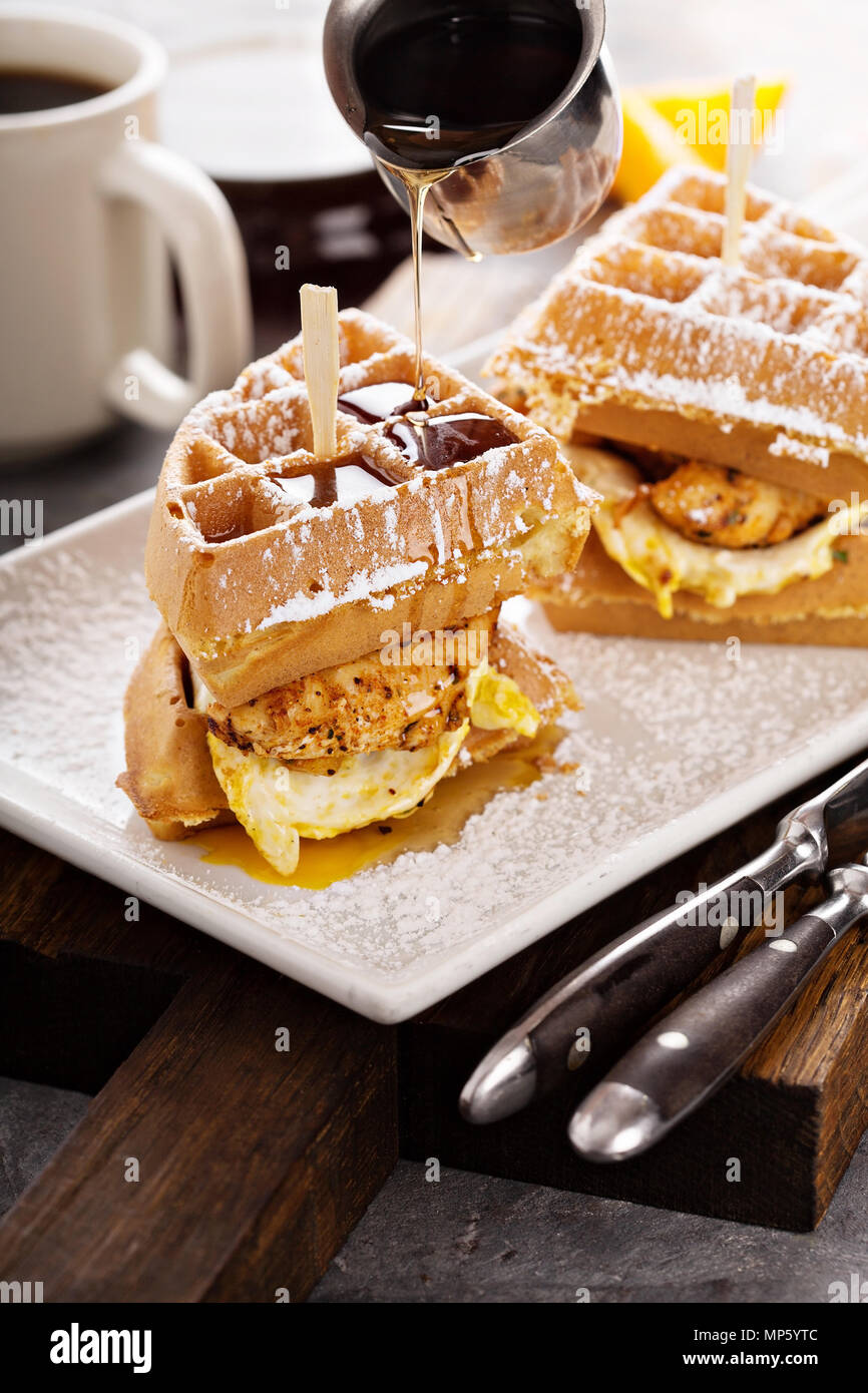 Waffle, fried egg and fish sandwich Stock Photo - Alamy