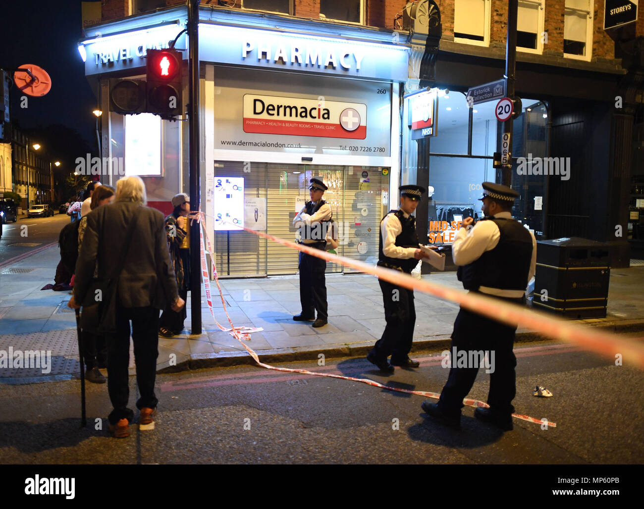 Police officers at the scene on upper street in islington hi-res stock ...