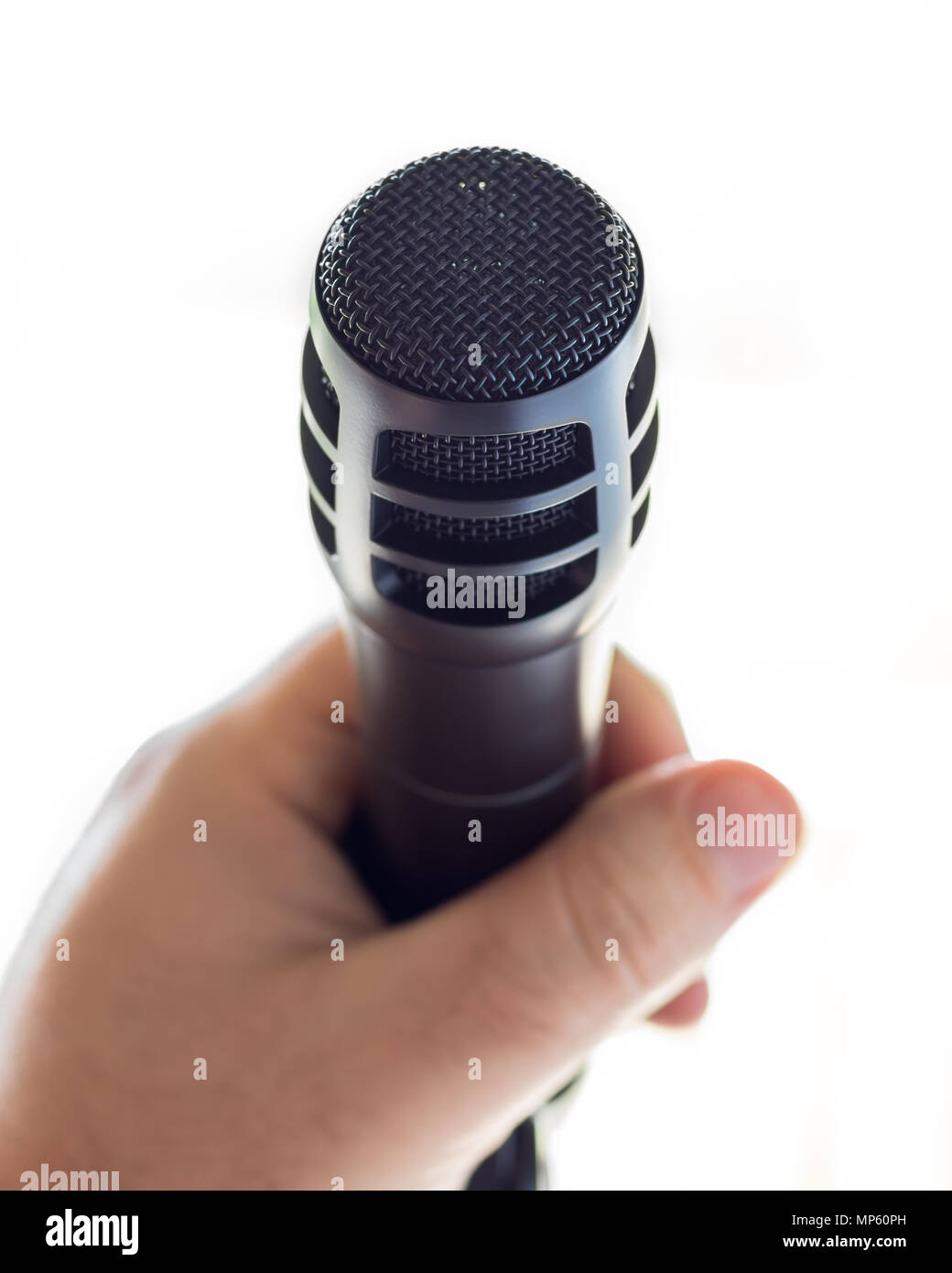 Hand holding microphone stand hi-res stock photography and images - Alamy