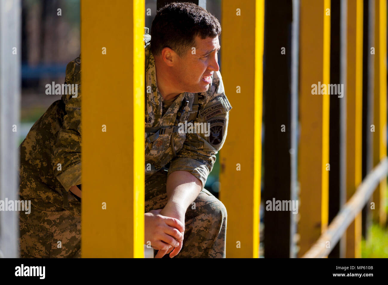 U.S. Army Ranger Maj. Anthony Aguilar, assigned to USASOC, takes a rest ...