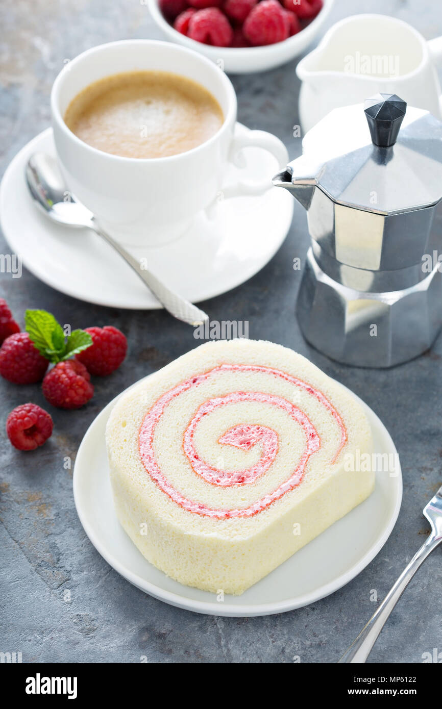 Vanilla roll cake with berry filling Stock Photo - Alamy