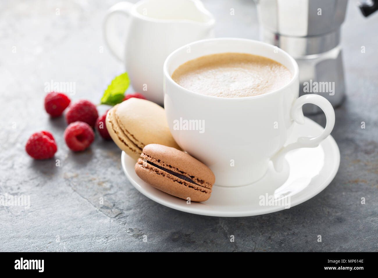 A cup of espresso coffee with macarons Stock Photo - Alamy