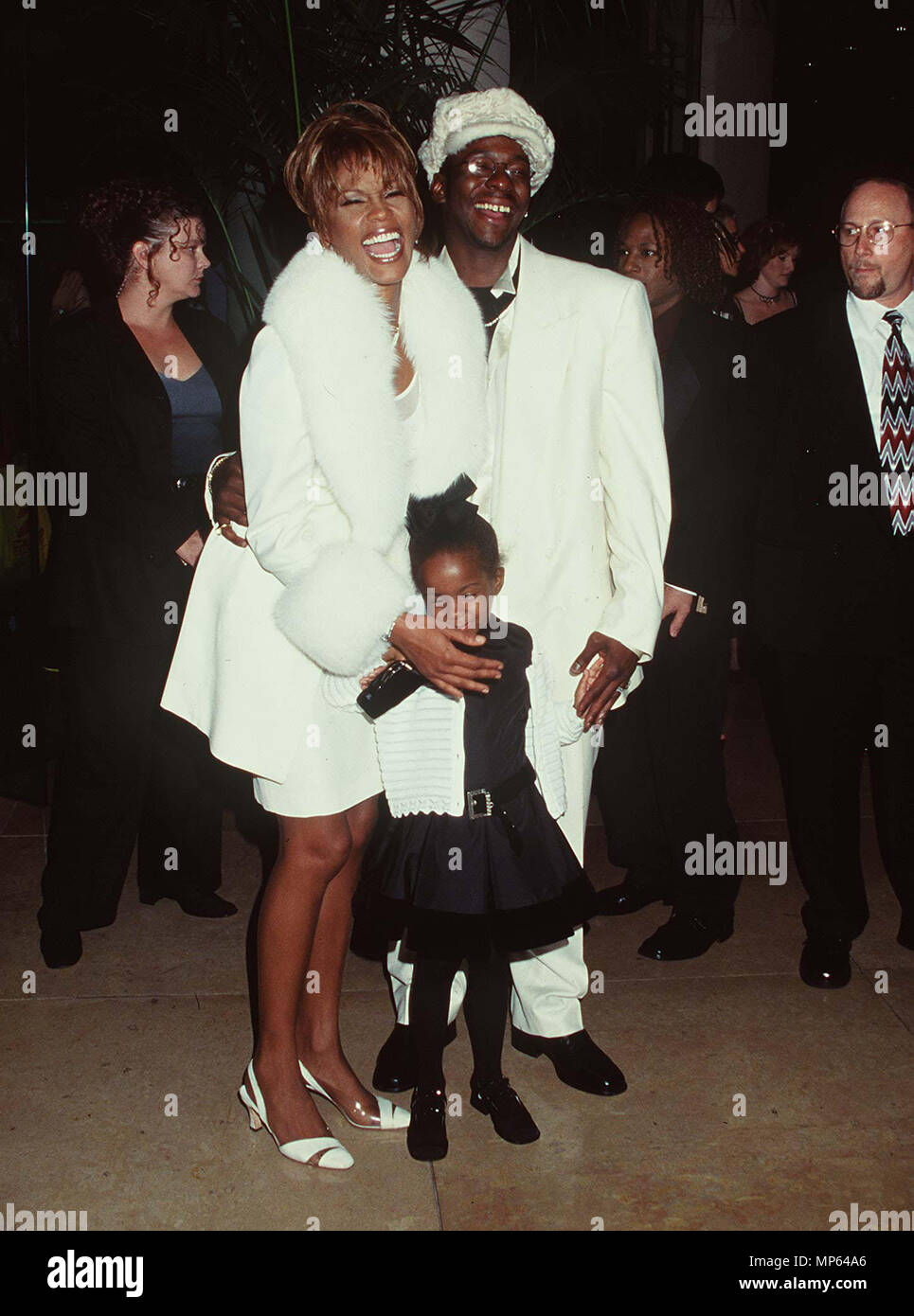 Whitney Houston with Bobby Brown ( and daughter Christina )Houston W ...