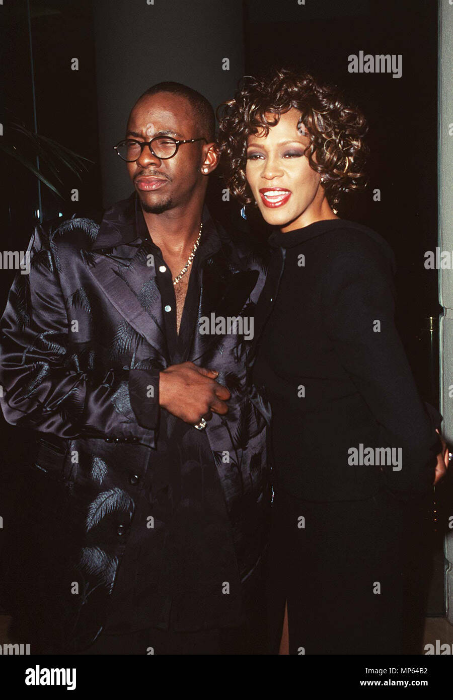 Whitney Houston with Bobby Brown ( and daughter Christina )HoustonWh ...