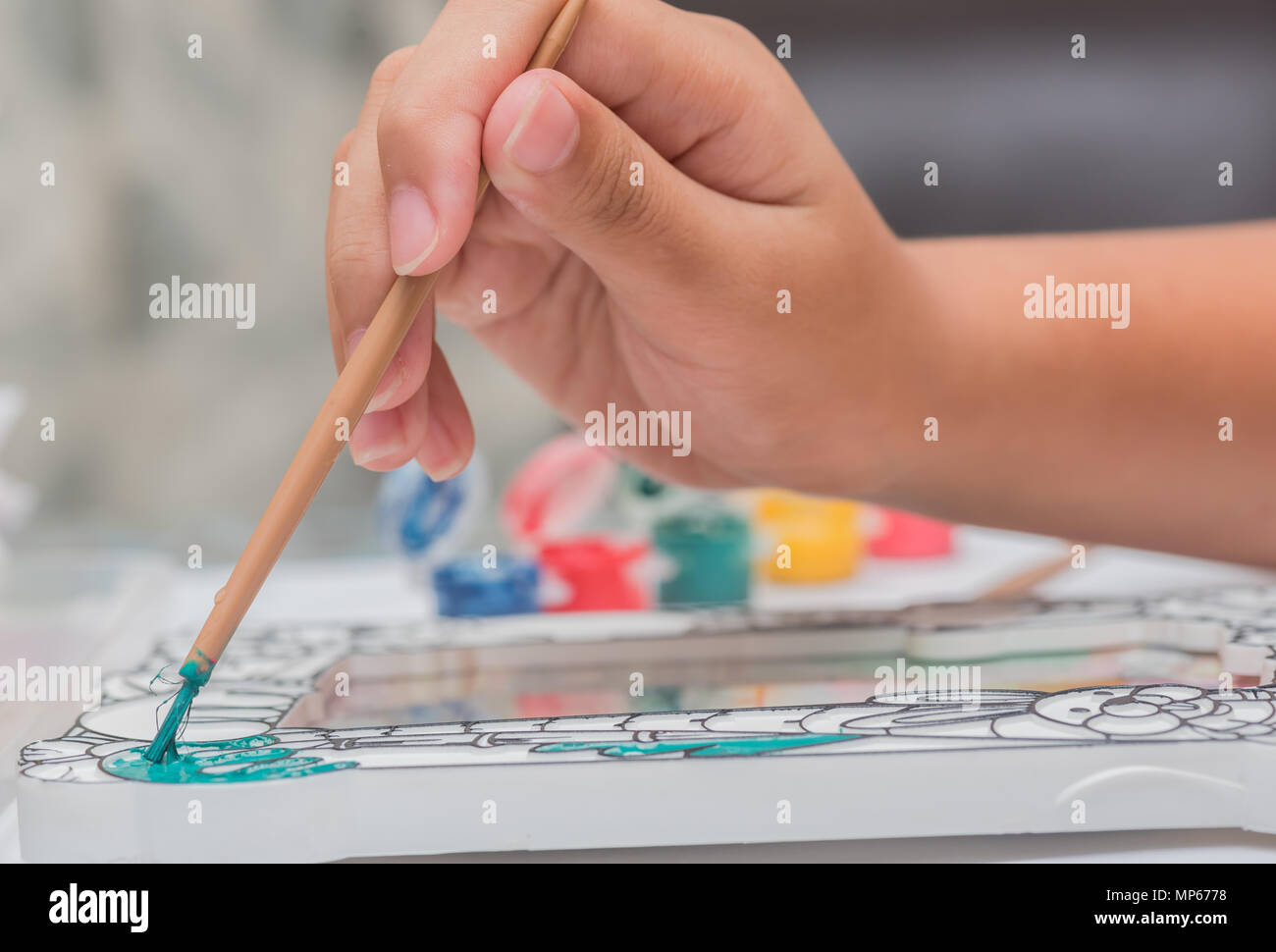 Children learn coloring and painting in classroom Stock Photo - Alamy