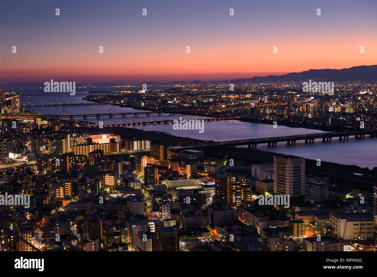 Views of Osaka city at sunset from Umeda Sky building observatory ...