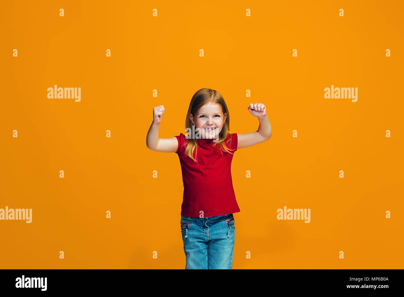 Happy success teen girl celebrating being a winner. Dynamic energetic ...