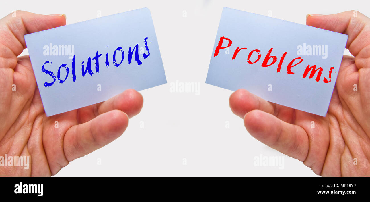 man hands holding cards with the words problems and solutions Stock ...
