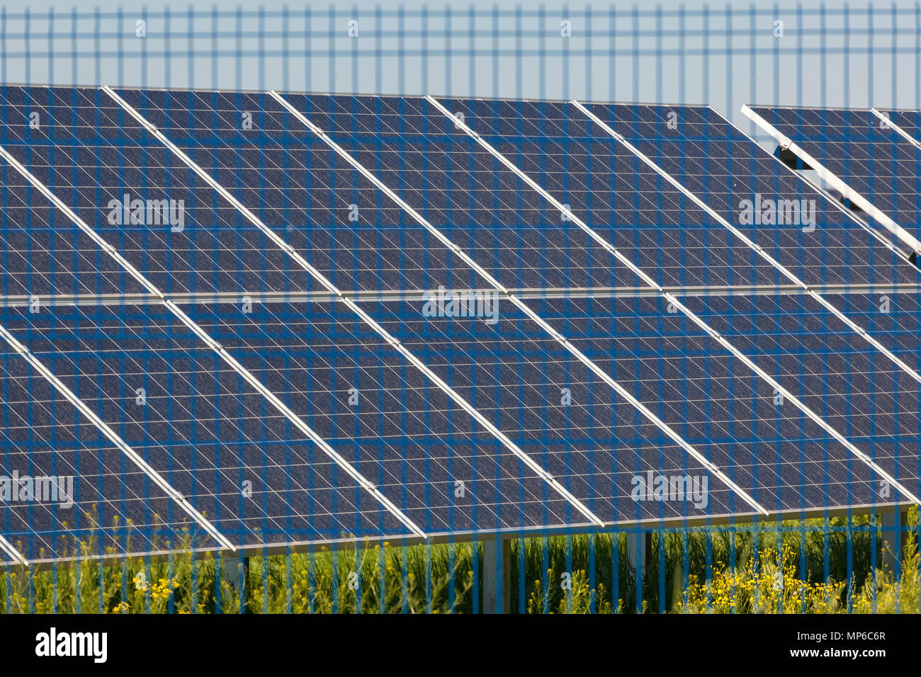 Grin clean electric power - Solar panel outside on grass field photo ...