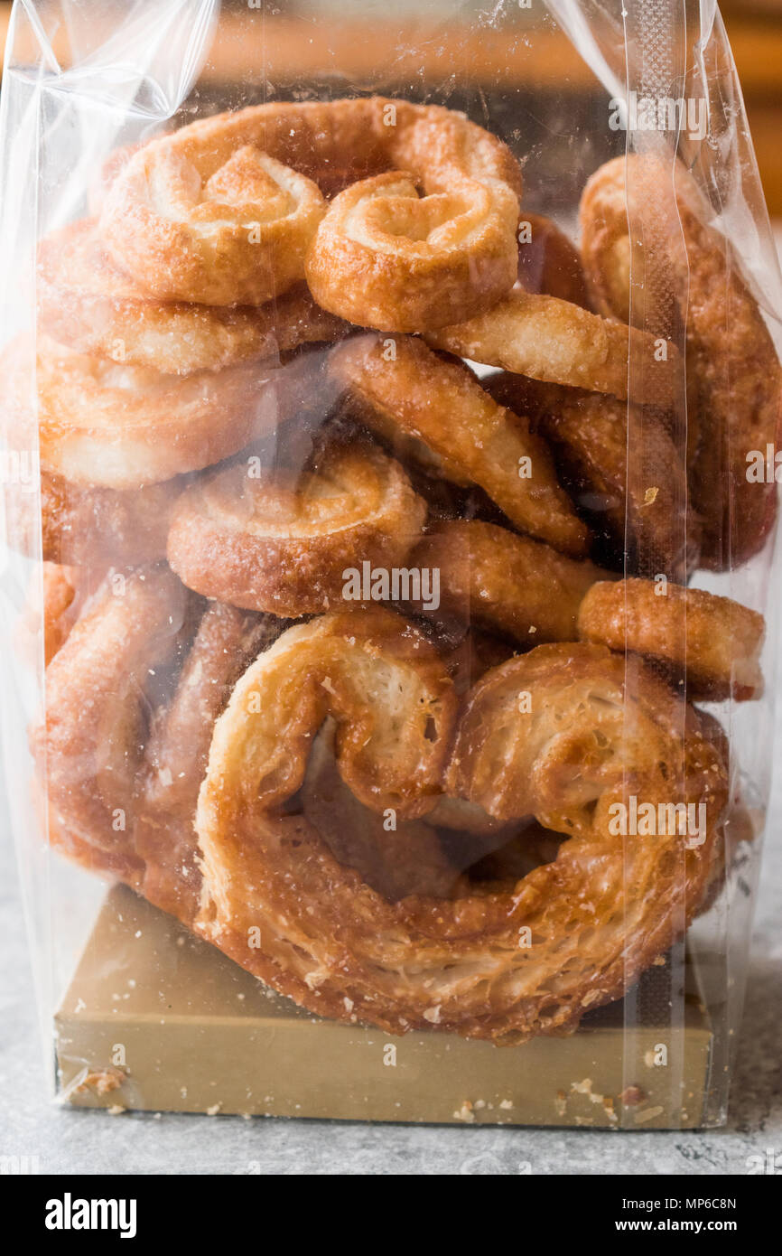 Package of Palmier Cookies in Plastic Bag. Dessert concept Stock Photo ...
