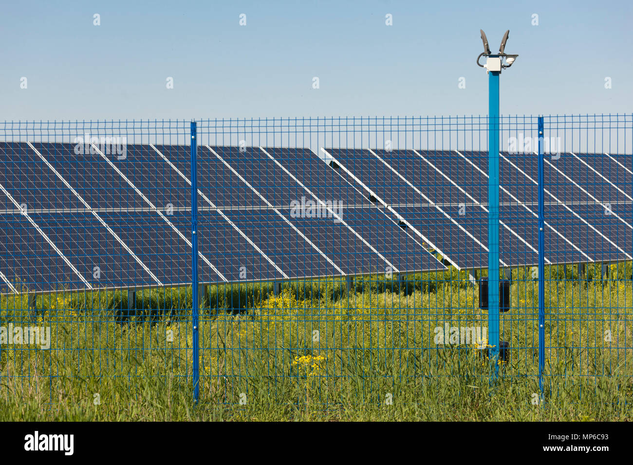 Grin clean electric power - Solar panel outside on grass field photo ...