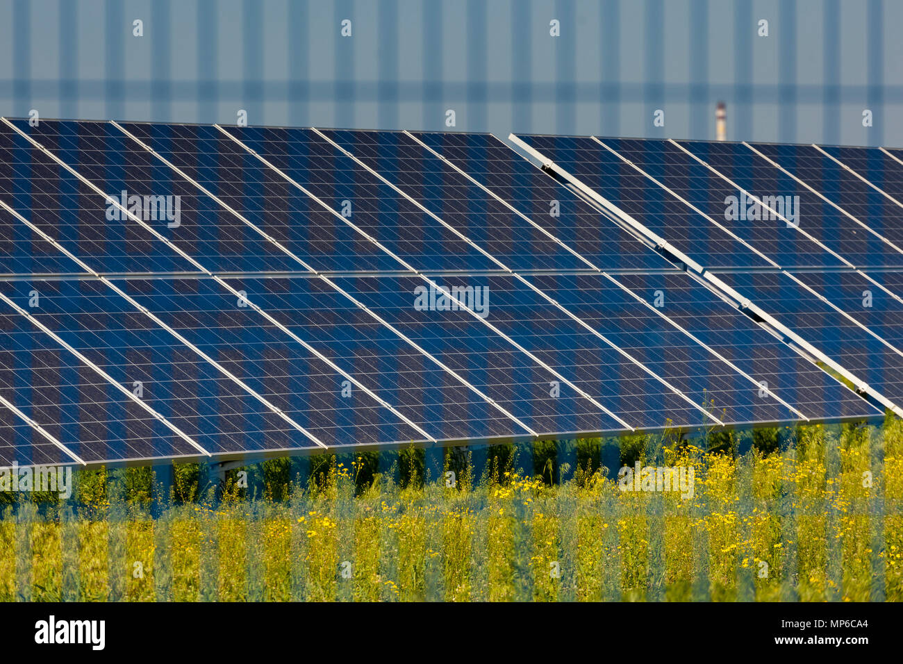 Grin clean electric power - Solar panel outside on grass field photo ...