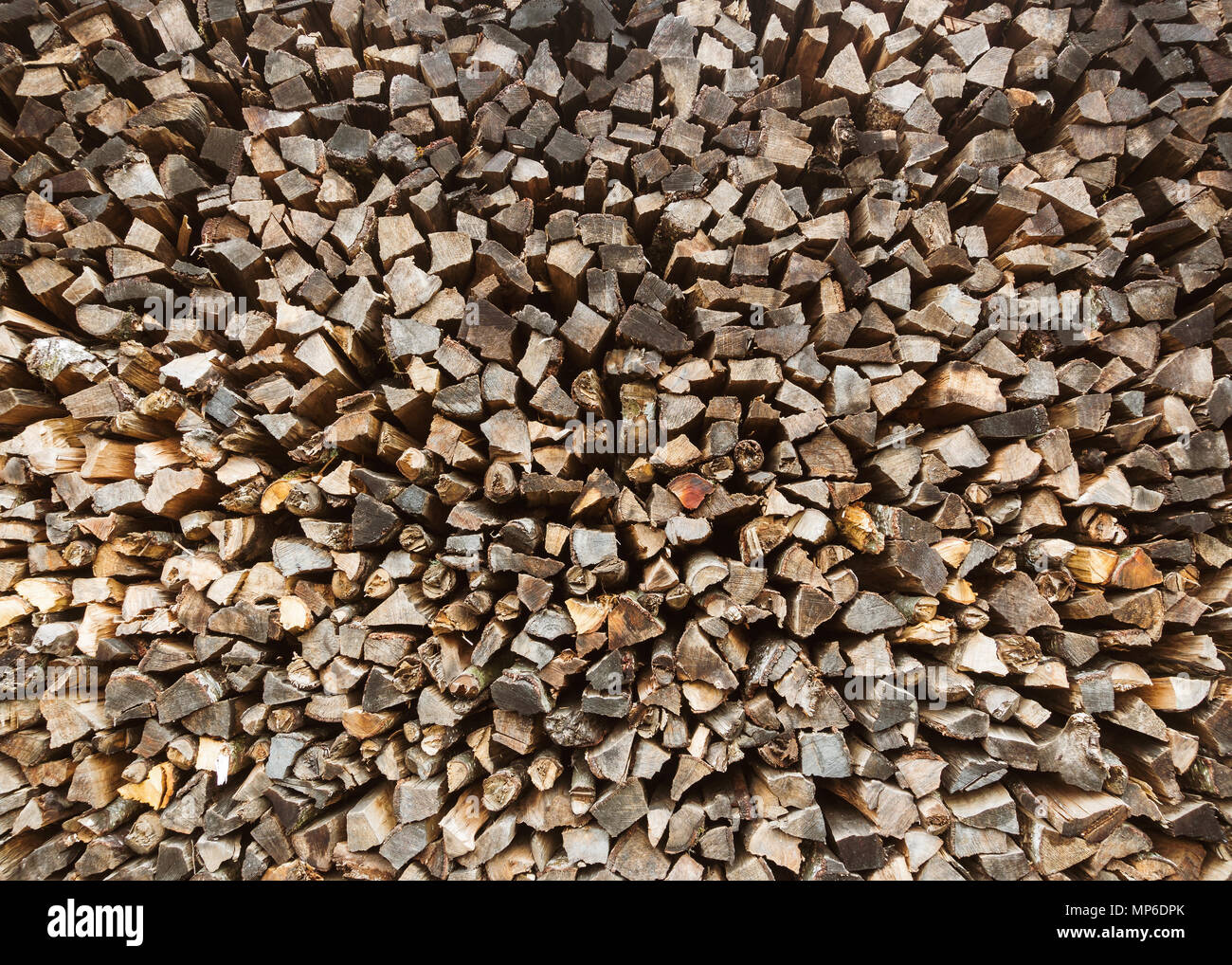 Stack of firewood, chopped firewood background Stock Photo - Alamy