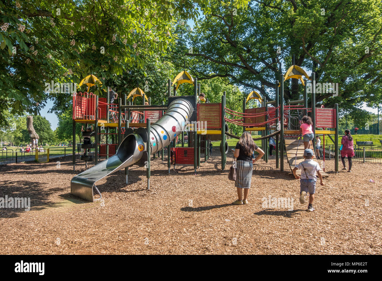 Children play outside on climbing frames in Prospect Park in Reading ...