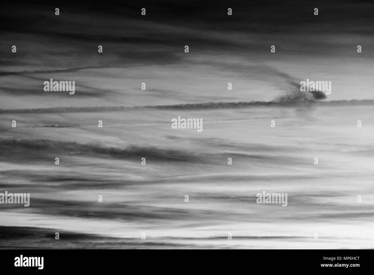 Clouds and jet vapor trails creating beautiful texture in the sky Stock ...